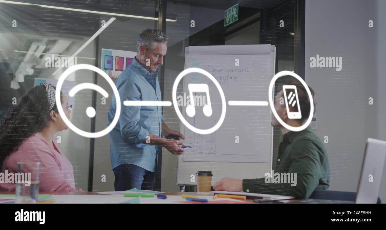 Image of digital icons and data processing over diverse business people ...