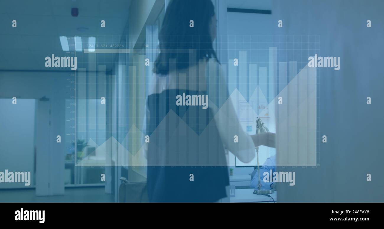 Image of graphs and loading bar over biracial woman walking in office ...