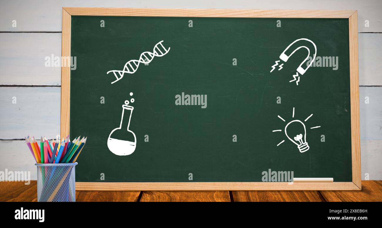 School blackboard displays drawings of DNA, magnet, a flask, and a ...