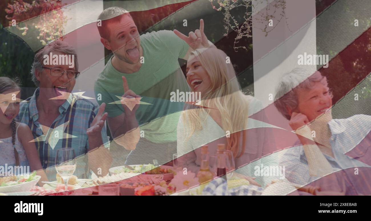 Caucasian family enjoying outdoor meal, laughing and sharing food Stock ...