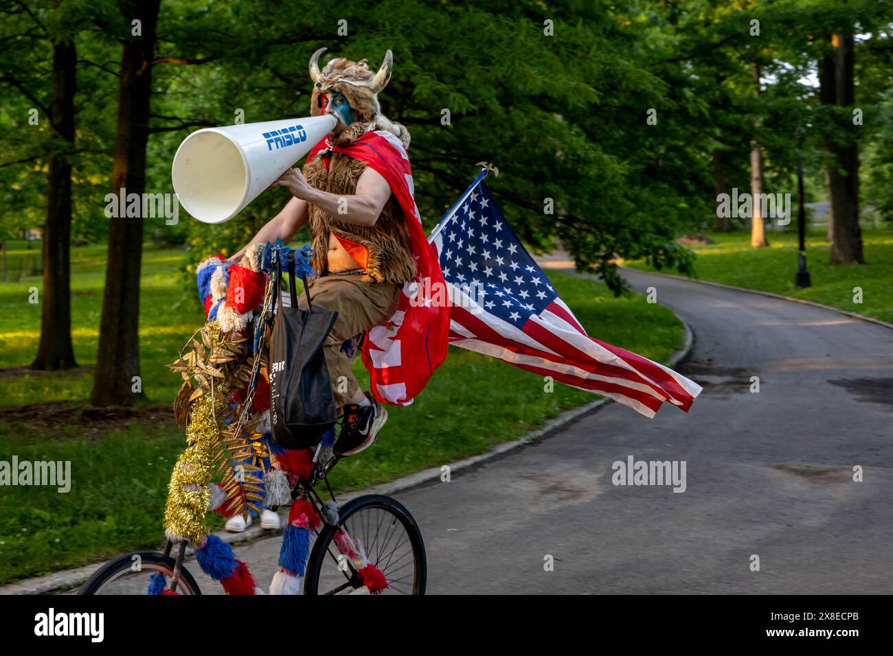 New York, United States. 18th May, 2024. A man dressed as the Qanon ...