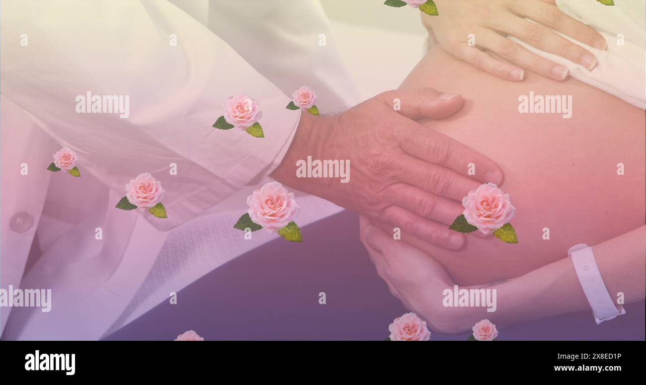 A Caucasian midwife and doctor examining pregnant woman Stock Photo - Alamy