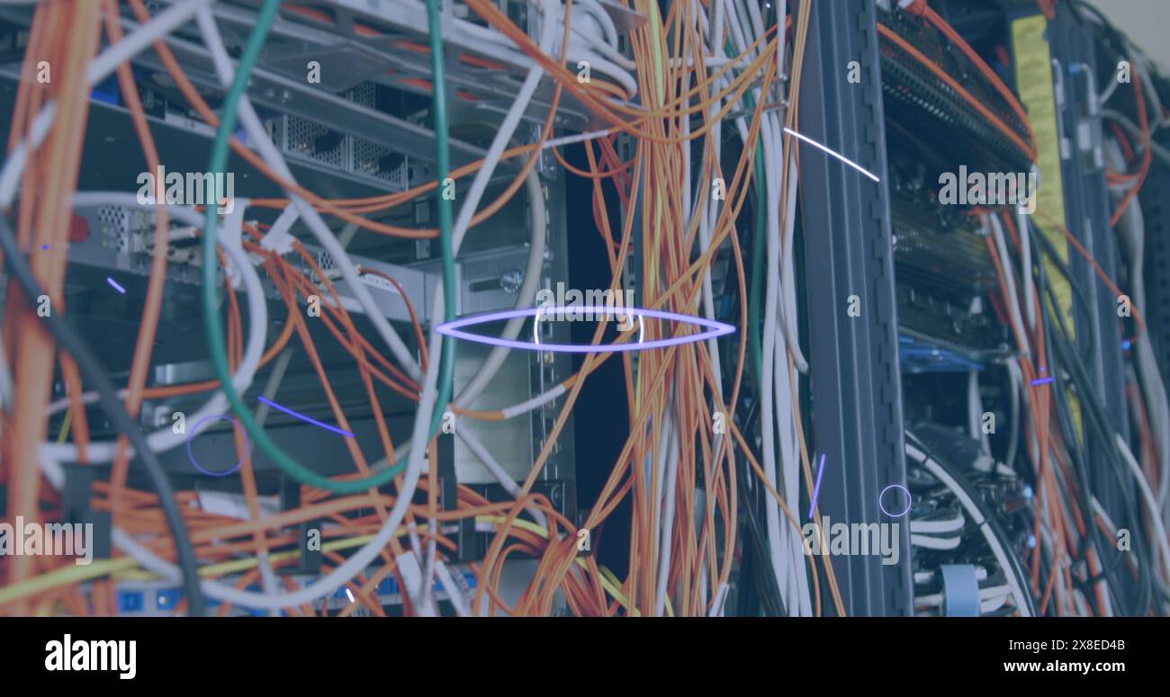 Colorful wires tangling around server racks Stock Photo - Alamy
