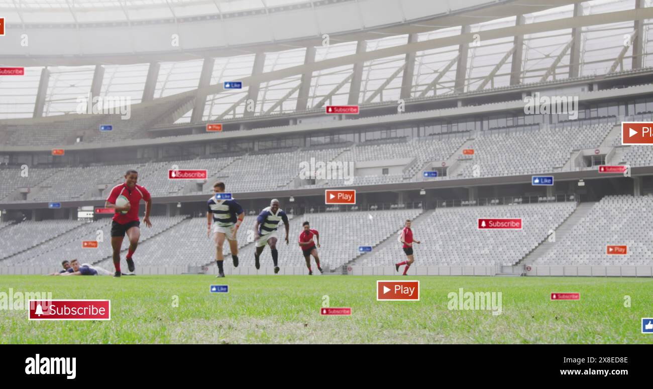 Group of friends wearing sports gear, playing rugby in large stadium ...