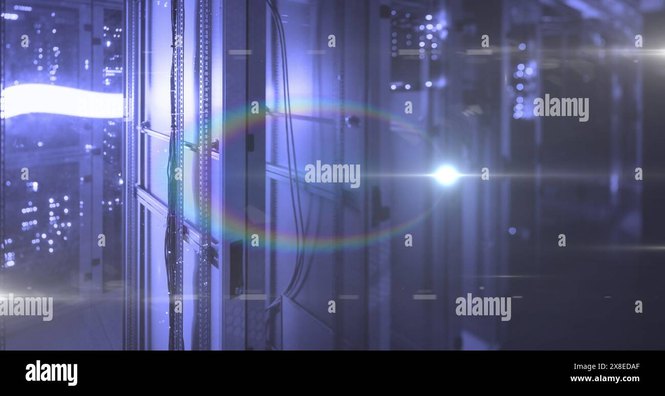 Rows of server racks glowing with blue lights in data center Stock ...