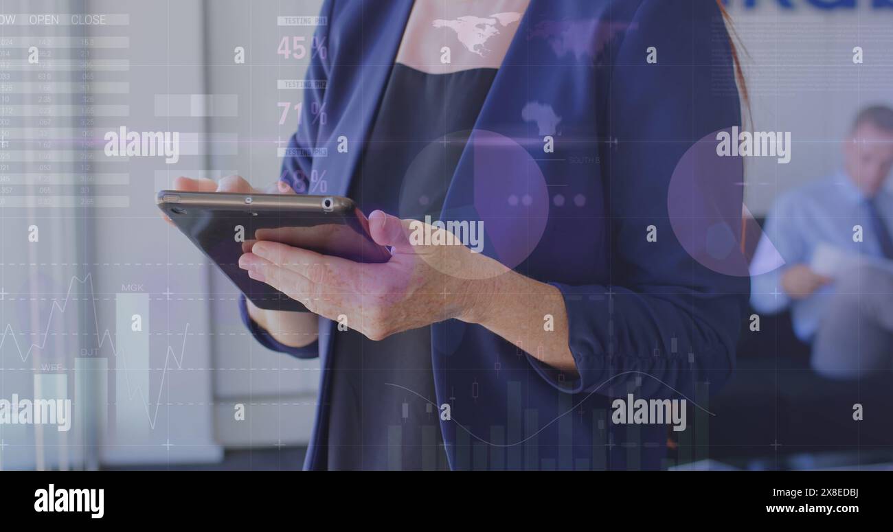 Using tablet financial data technology hi-res stock photography and images - Alamy