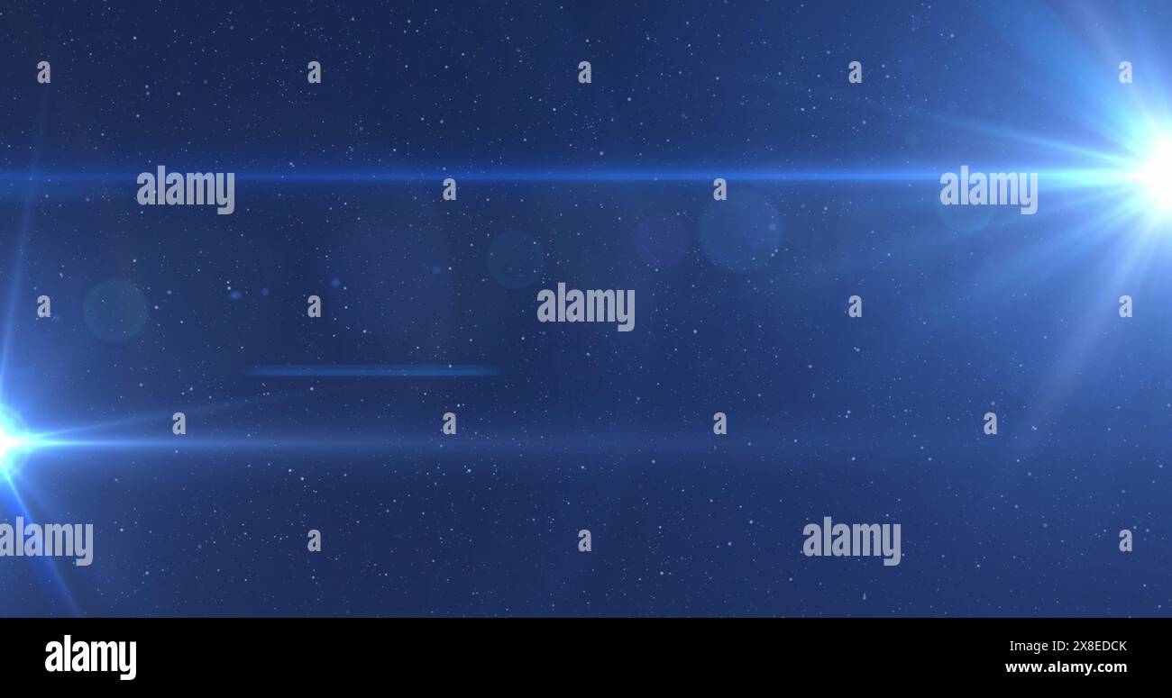 Two bright light sources shining in deep blue background Stock Photo ...