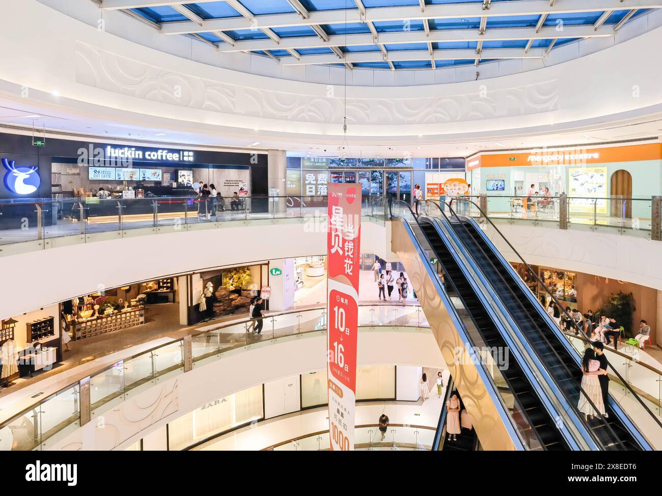 Hangzhou, China, May 24, 2024, People in Incity shopping mall at ...
