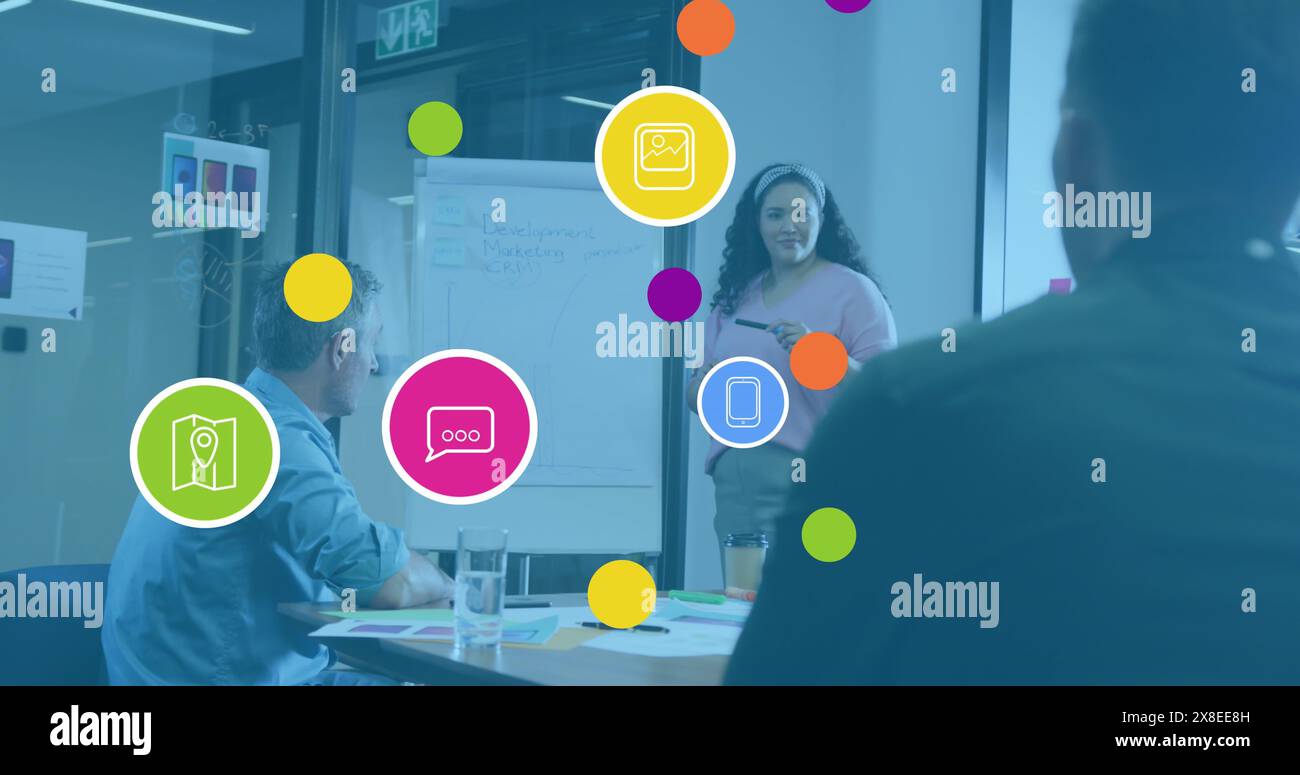 Image of social media icons over diverse business people having meeting ...