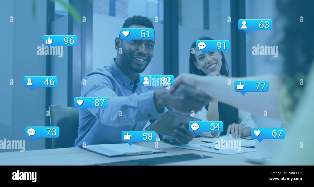 Image of social media icons with numbers over diverse business people ...