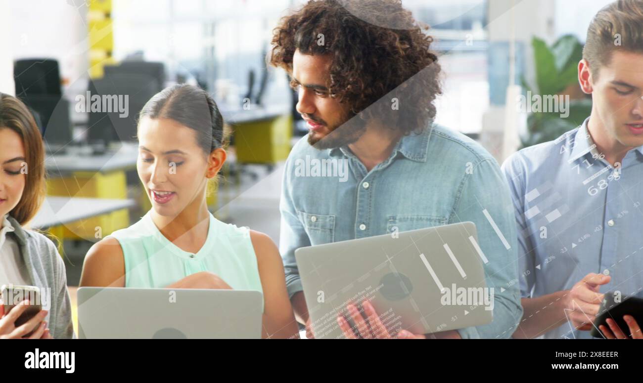 Image Of Statistical Data Processing Over Diverse Colleagues Using Electronic Devices At Office