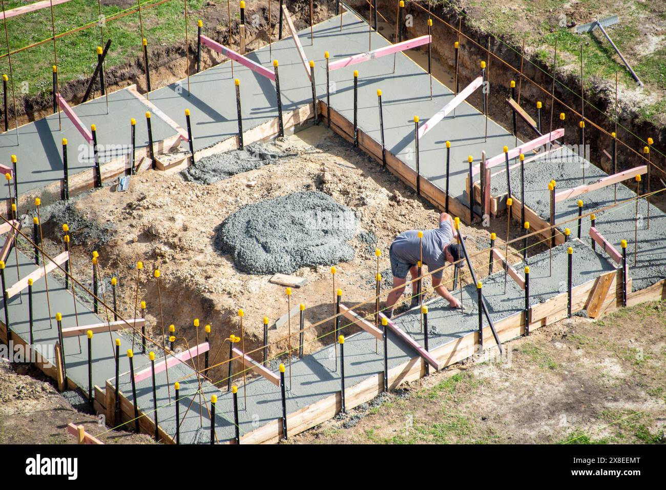 Cement pouring for Building Foundation Stock Photo - Alamy