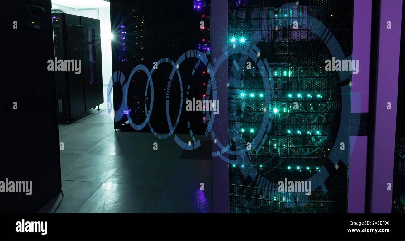 Image of moving circles forming tunnel over illuminated server room in ...