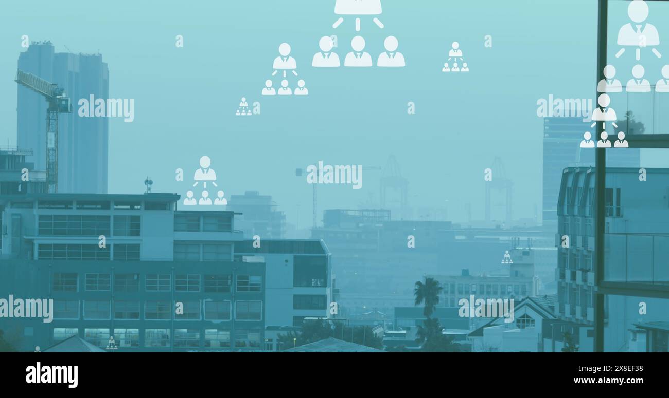 Image of network of profile icons floating against aerial view of ...