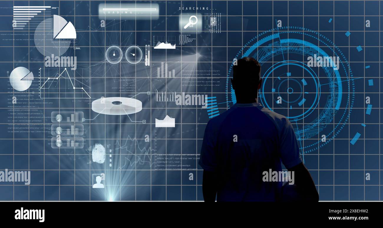 Image of rear view of male athlete with rugby ball looking at reports ...