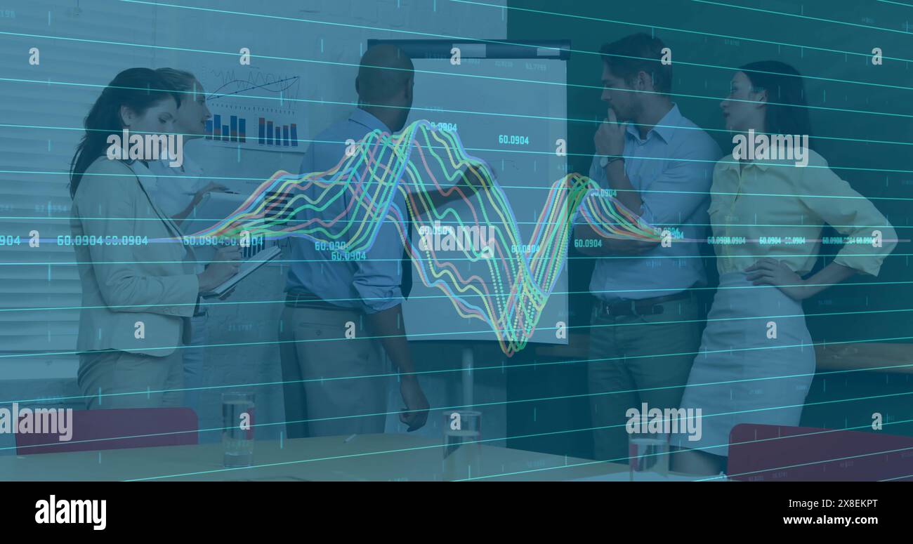 Image of line graphs moving over diverse businessman giving ...