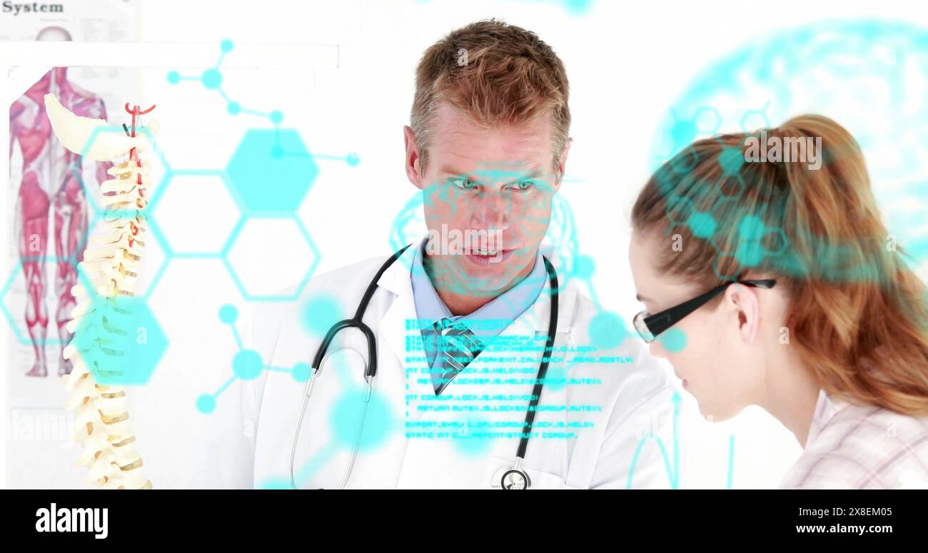 Image of medical data processing over caucasian male and female doctor ...