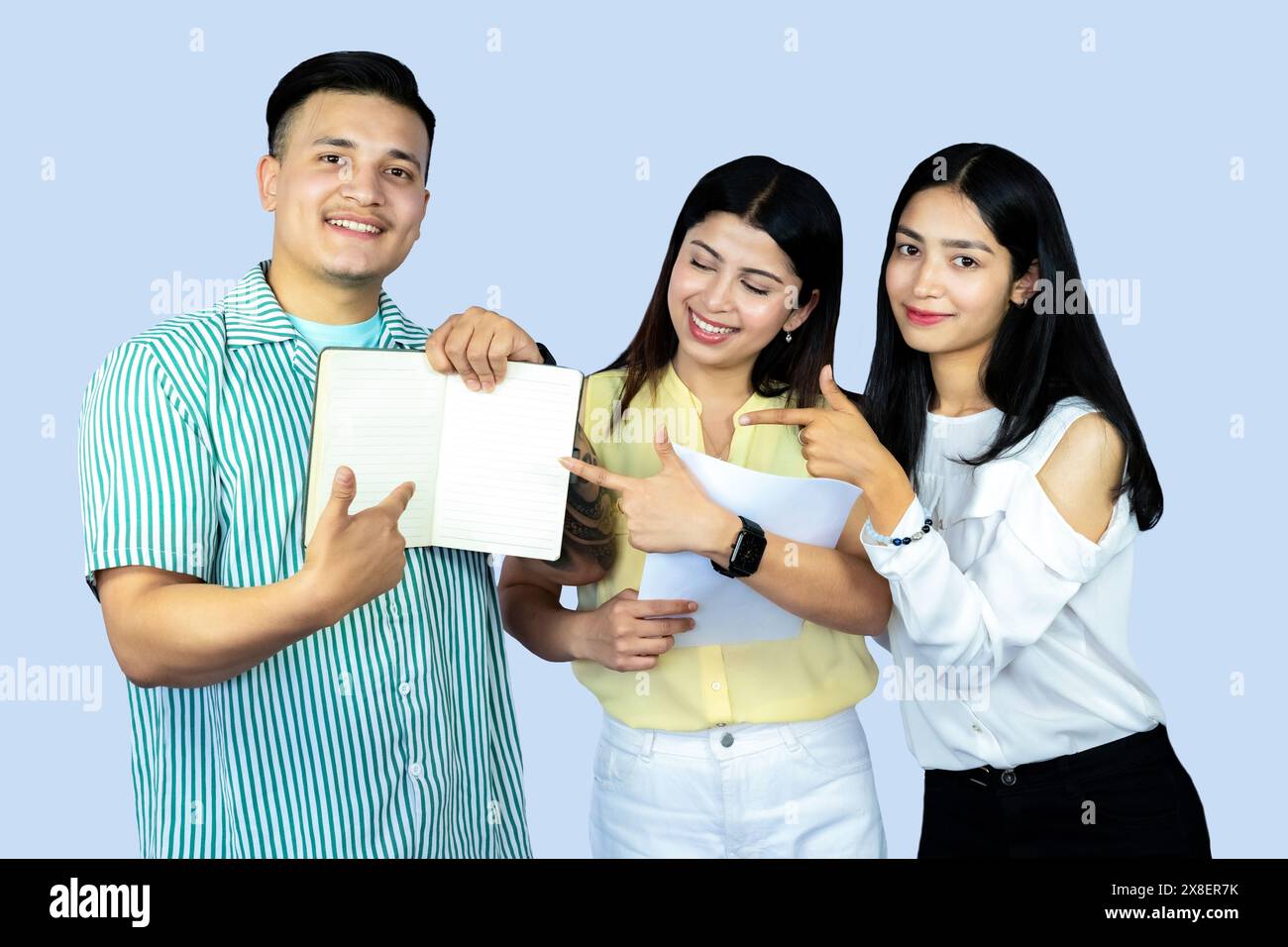 A group of copywriter friends with notepad, mobile phone, laptop giving ...