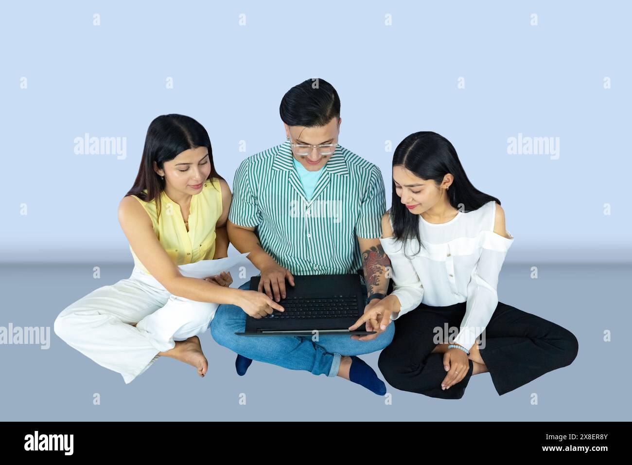 A group of copywriter friends with notepad, mobile phone, laptop giving ...