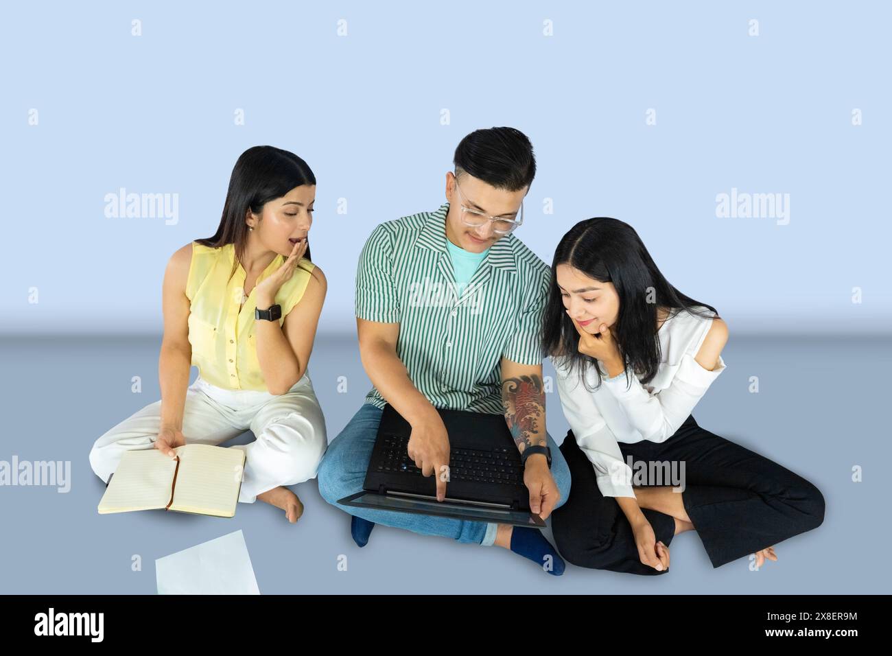 A group of copywriter friends with notepad, mobile phone, laptop giving ...