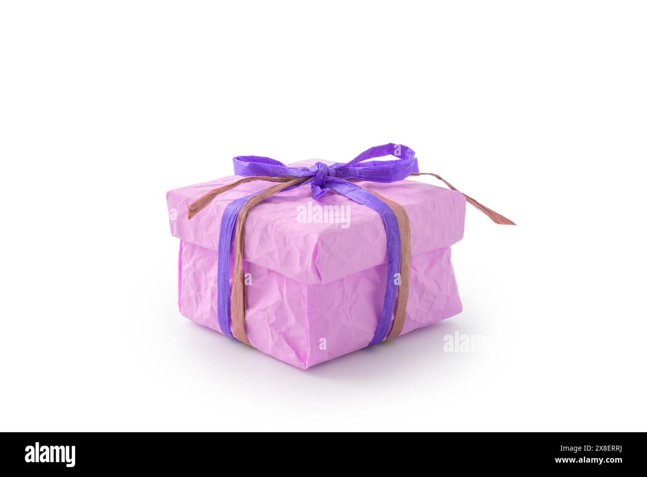 crumpled paper pink present box with recycled paper ribbon isolated on ...