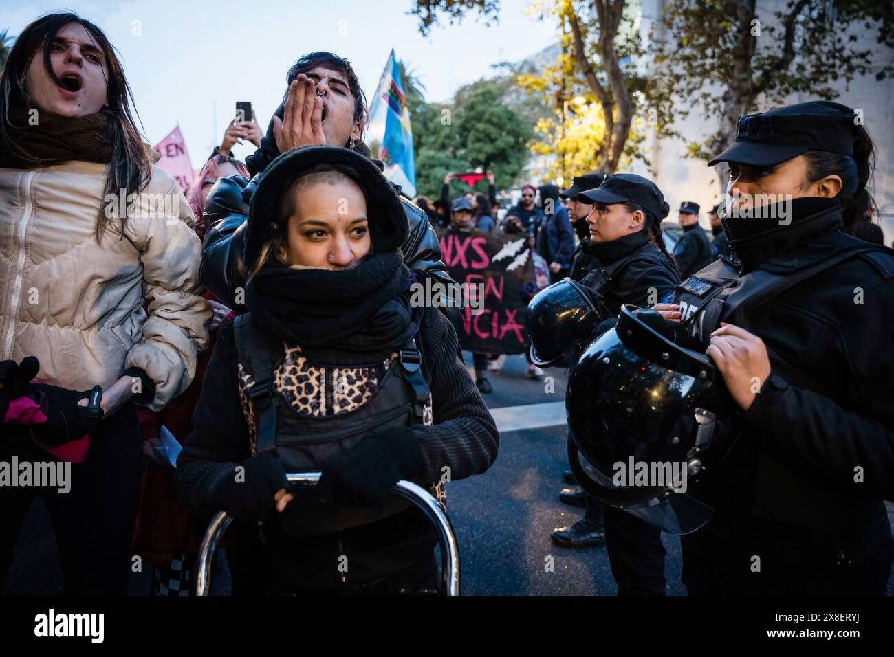 Buenos Aires, Argentina. 24th May, 2024. Protester walk past police ...