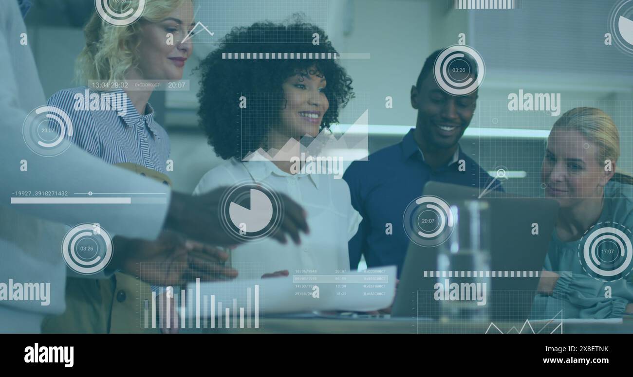 The business colleagues are talking and smiling in a meeting room ...