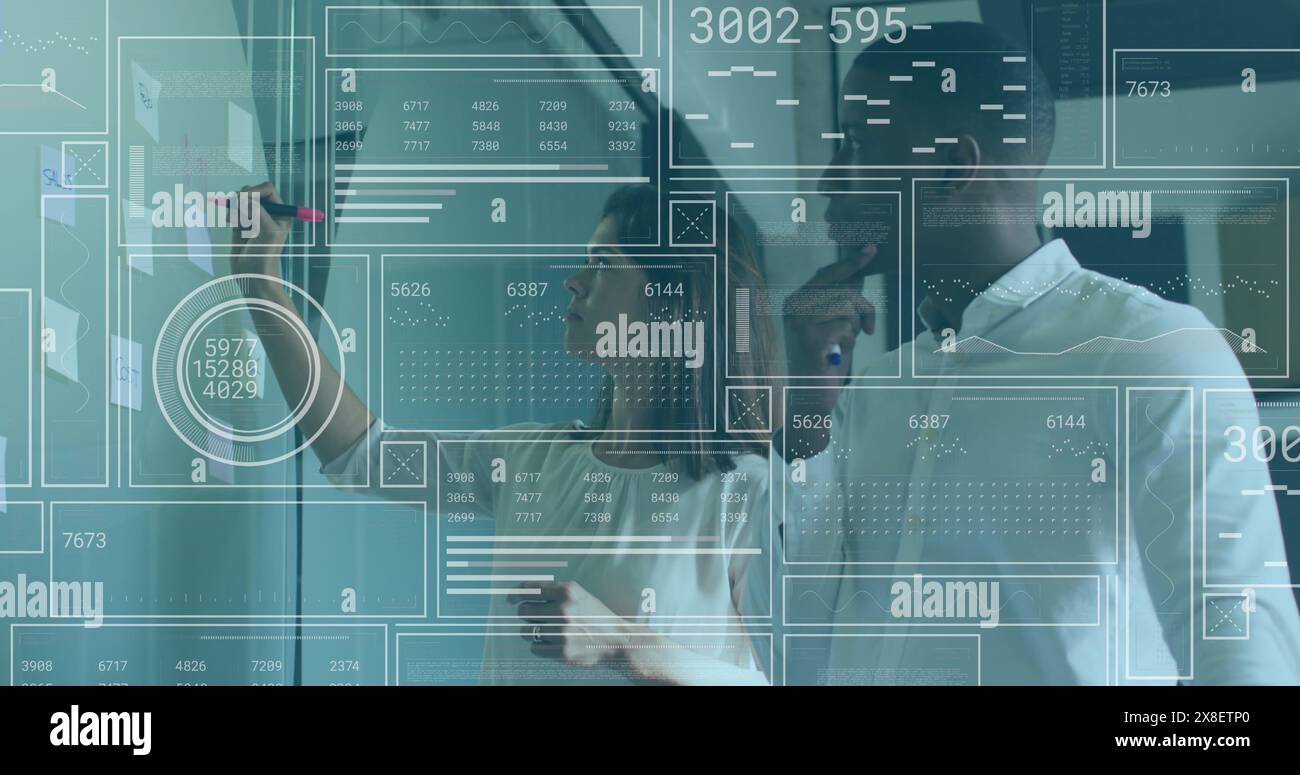 Image of data processing and diverse male and female colleagues writing ...