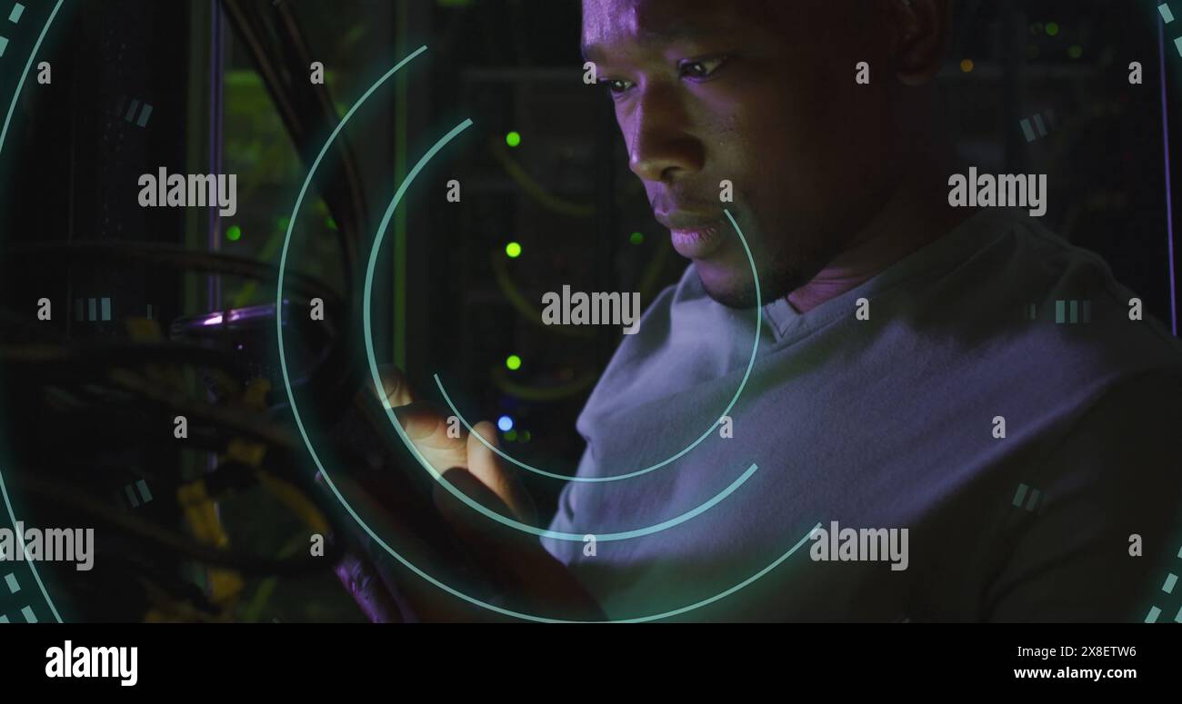Image of scope scanning over african american male hacker in server ...