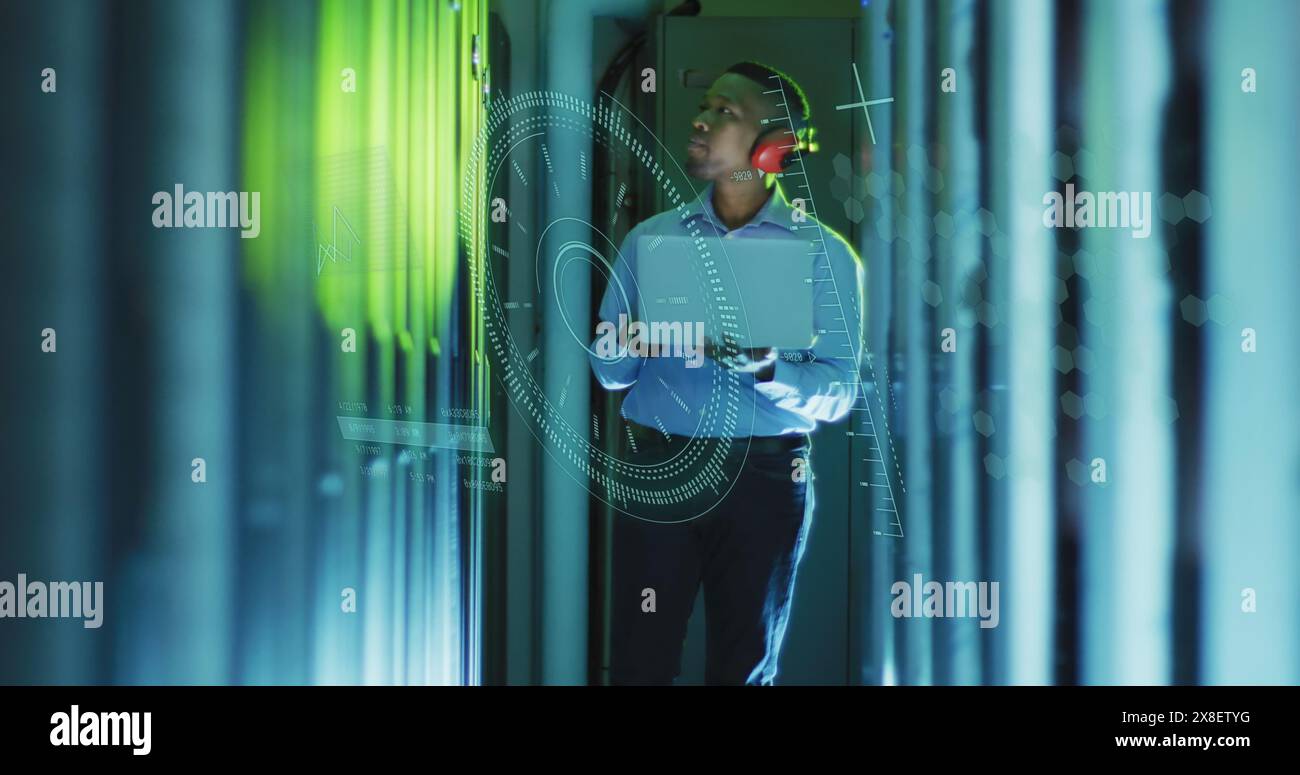 Image of data processing over african american male worker with laptop ...