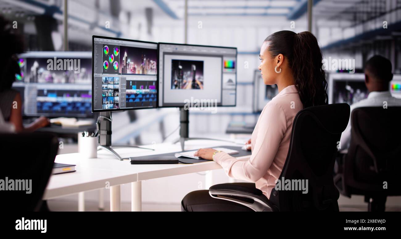 African American Video Editor Tech Job Using Computer Stock Photo - Alamy