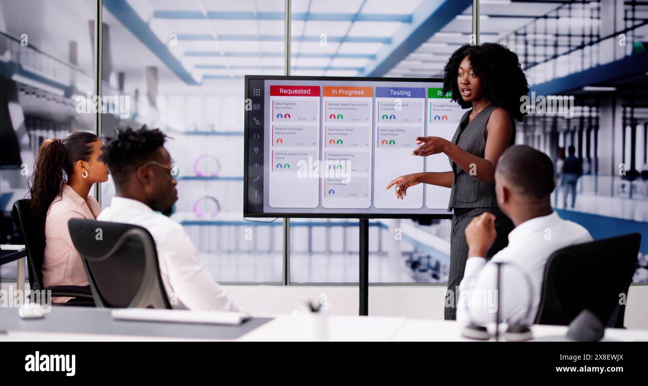 Corporate Training Presentation In Classroom With Computers Stock Photo ...