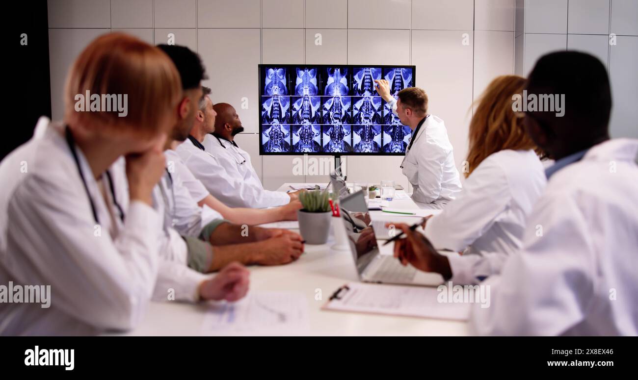 Diverse Doctors Team Looking At MRT Scans Stock Photo - Alamy