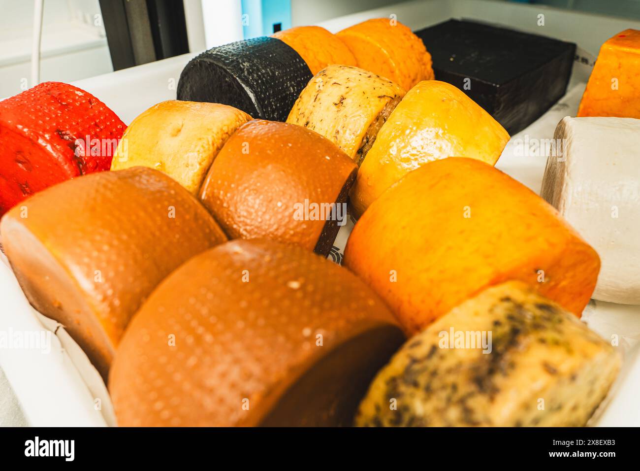 View cheese wheels parmesan maturing hi-res stock photography and ...