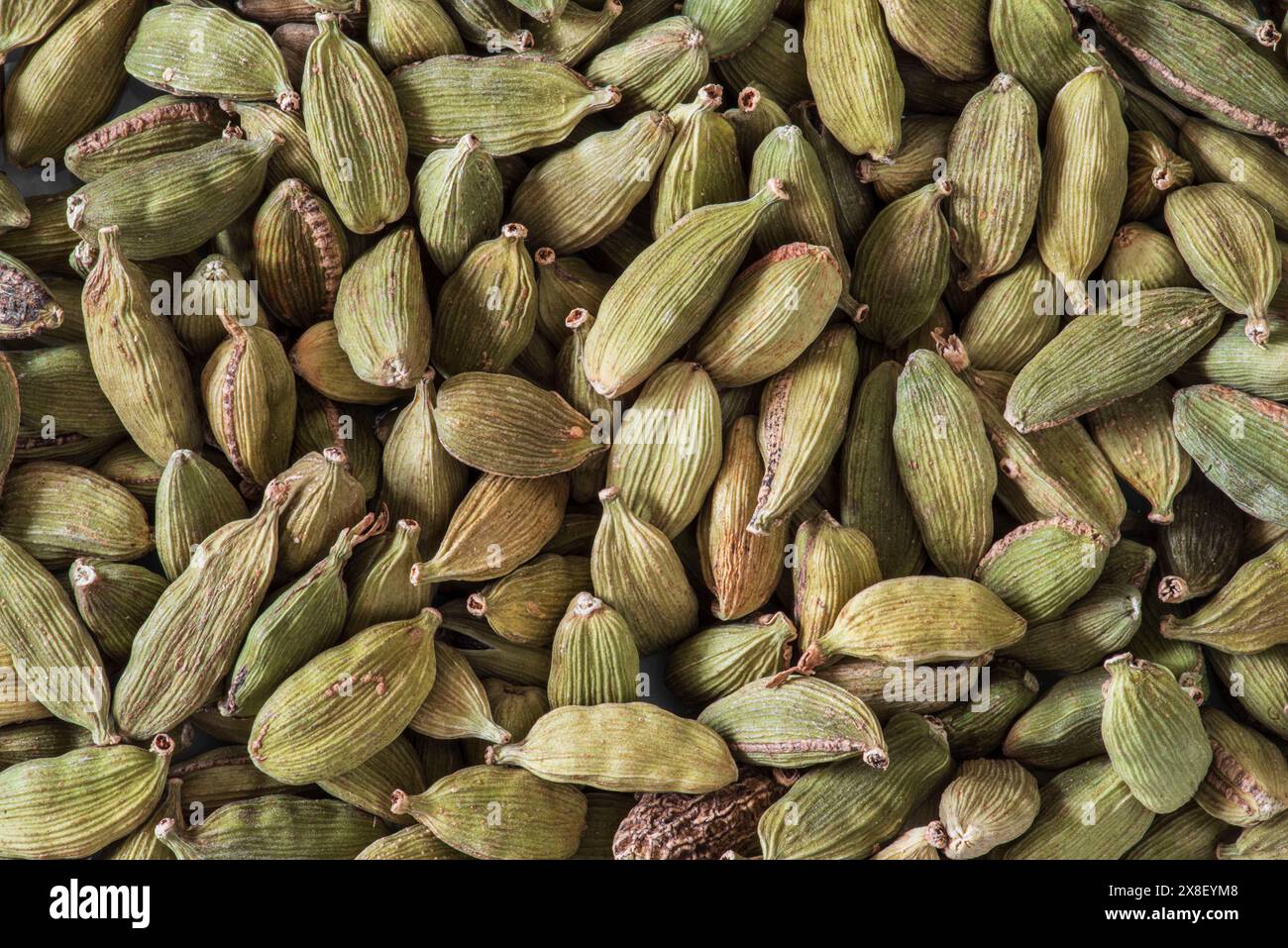 Green cardamom seeds texture background hi-res stock photography and ...