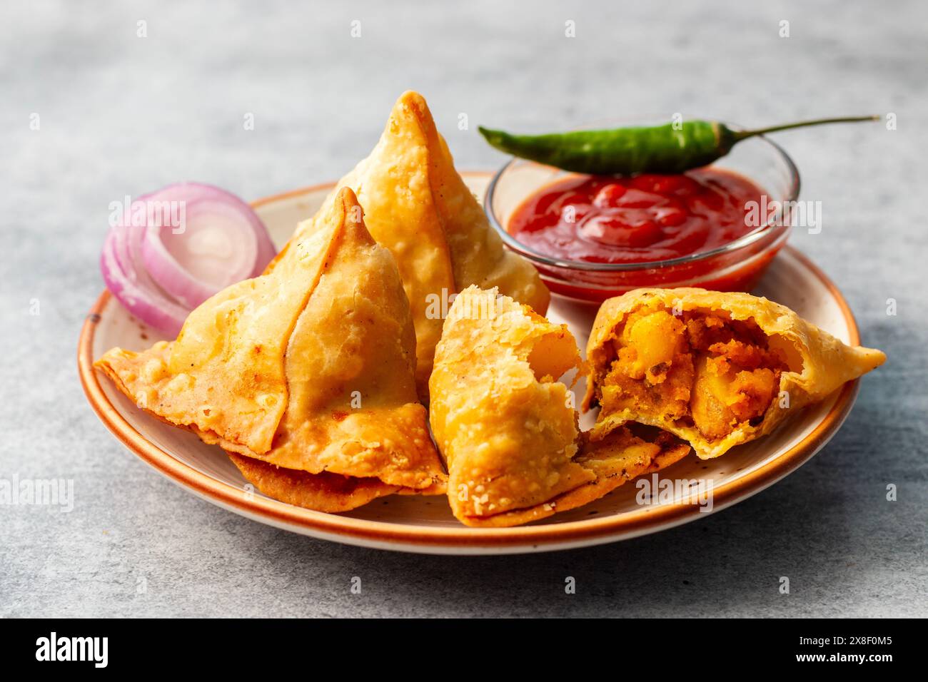 selective focus Samosa, Spiced potato-filled pastry, crispy, Savory ...