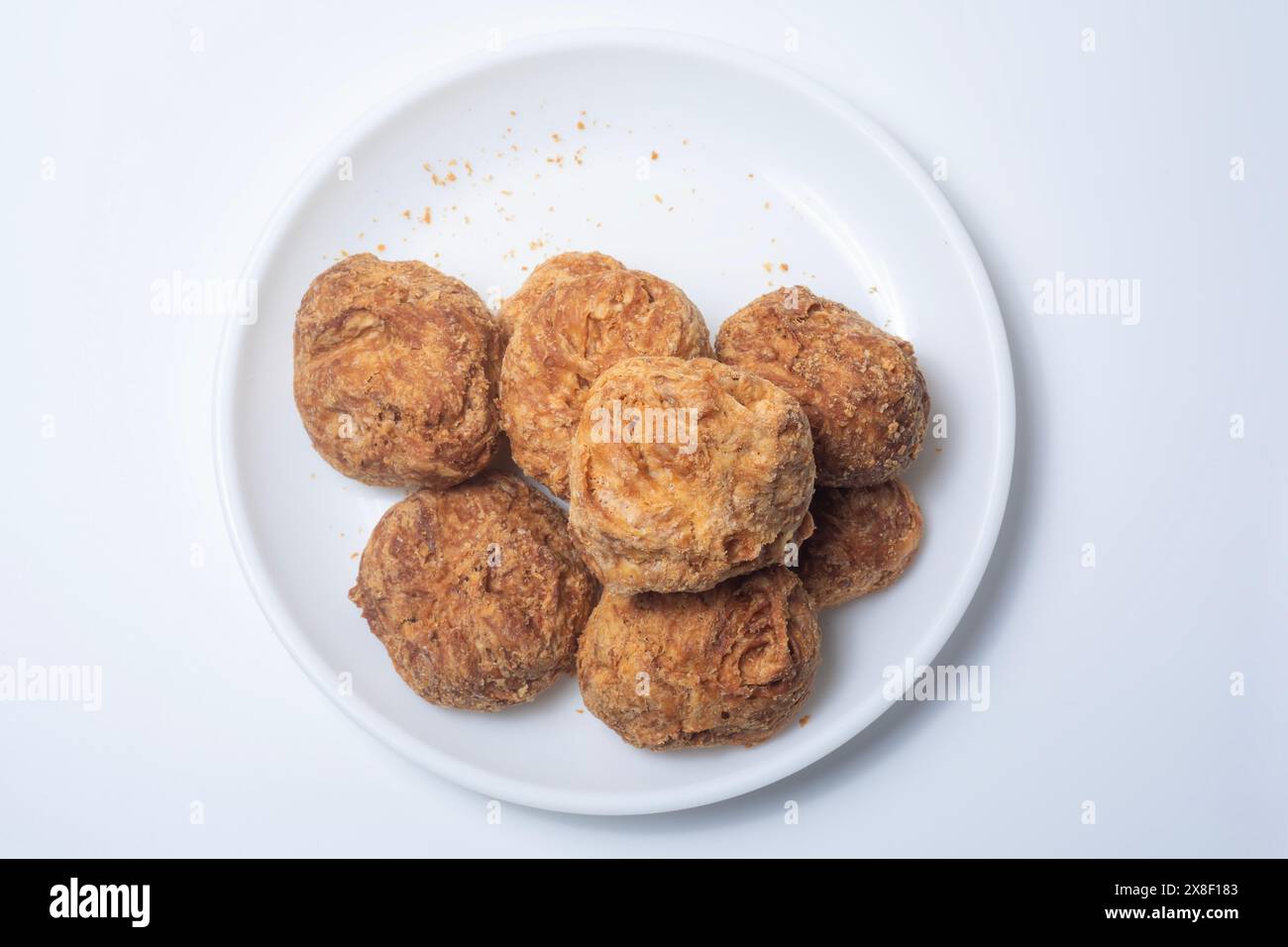 Indian famous tea snacks ooty varkey pastry on white plate on a white ...
