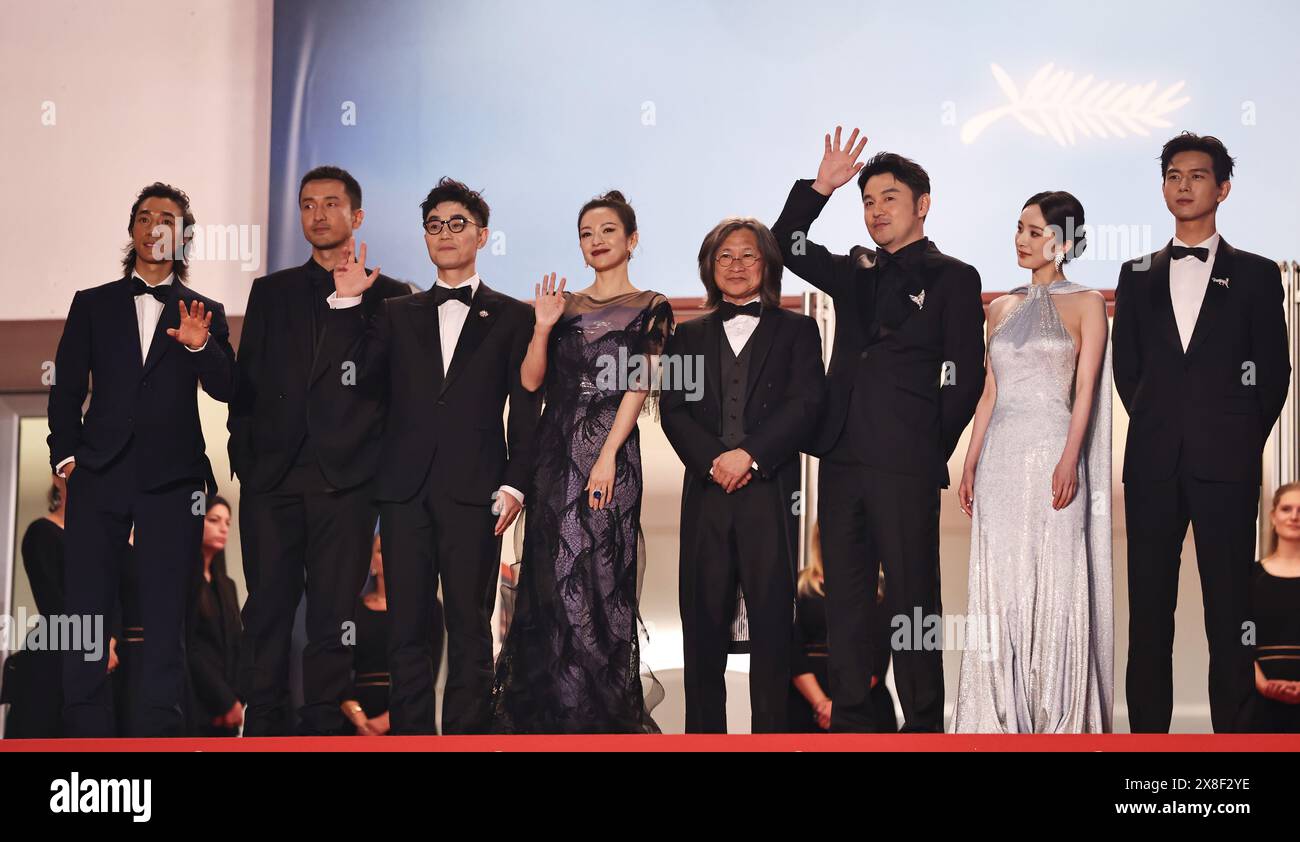 Cannes, France. 24th May, 2024. Director Peter Ho-sun Chan (4th R) arrives with cast members for ...