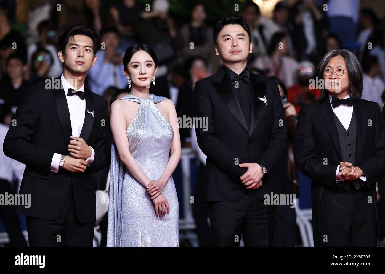Cannes, France. 24th May, 2024. Actor Li Xian, actress Yang Mi, actor Lei Jiayin, and director ...