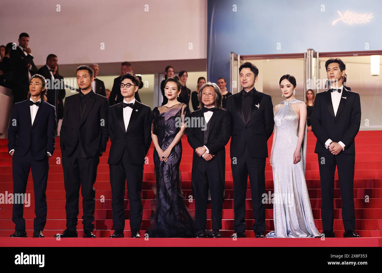 Cannes, France. 24th May, 2024. Director Peter Ho-sun Chan (4th R) arrives with cast members for ...