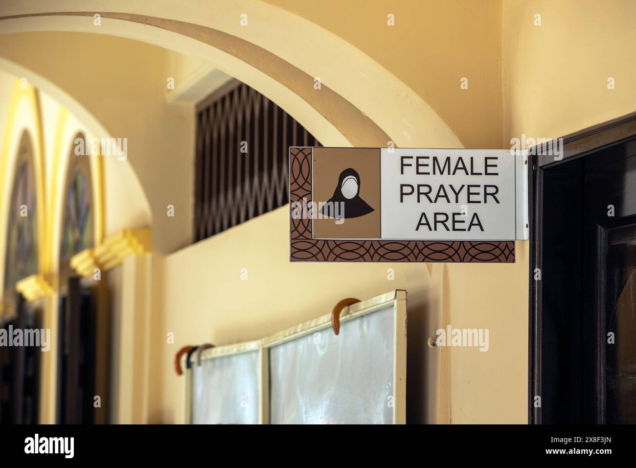 Female Prayer area sign, Singapore Stock Photo - Alamy