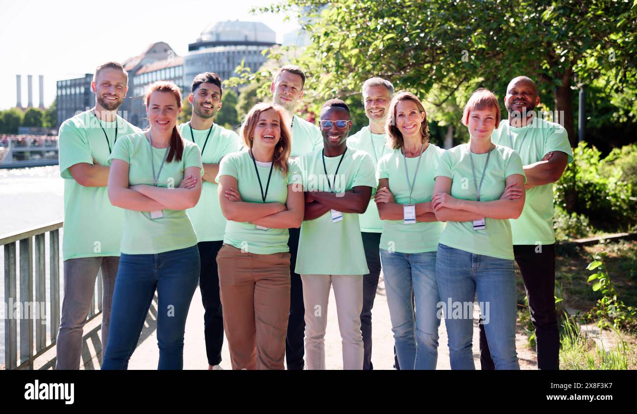 Diverse Group Of People Volunteering Community. Team Service Stock ...