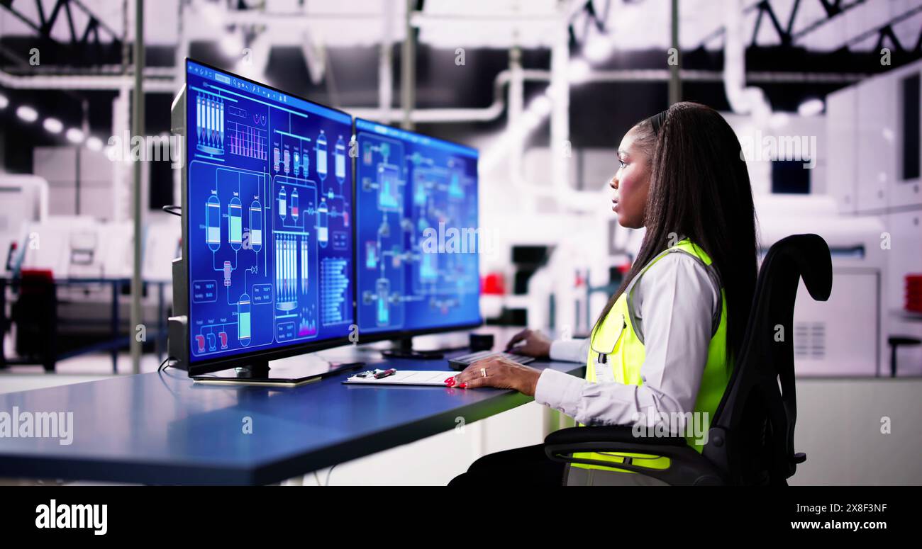 Engineer Operator Using Scada System At Industrial Plant Stock Photo - Alamy
