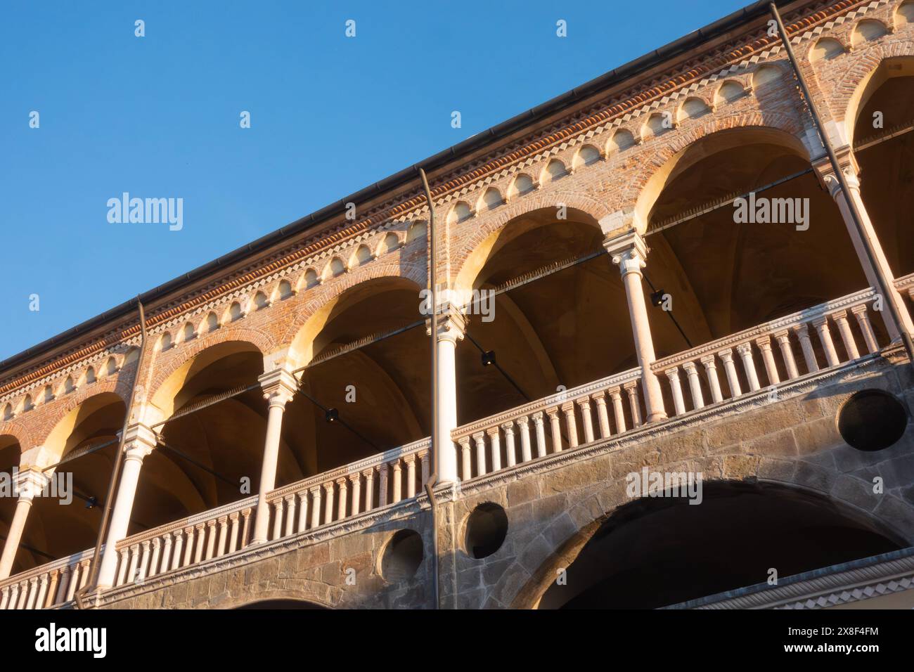 Medieval arches of historic building palazzo della ragione near piazza ...
