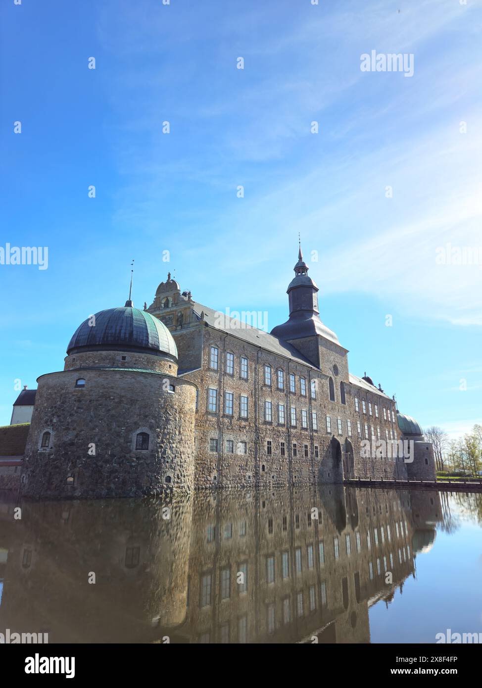 Historical Swedish medieval Vadstena castle with reflection in still ...