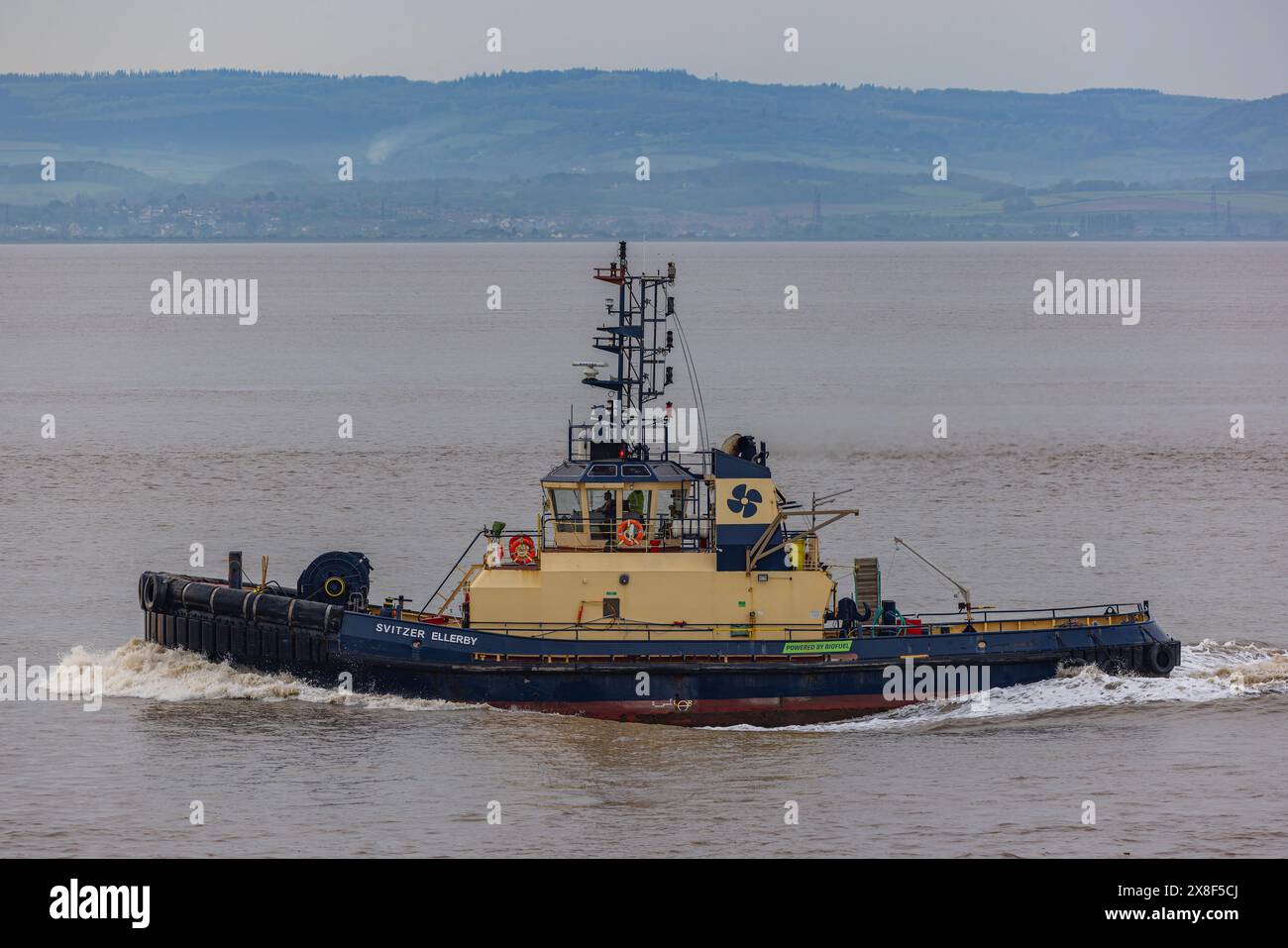Tug Svitzer Ellerby heading out to meet container vessel and guide it ...