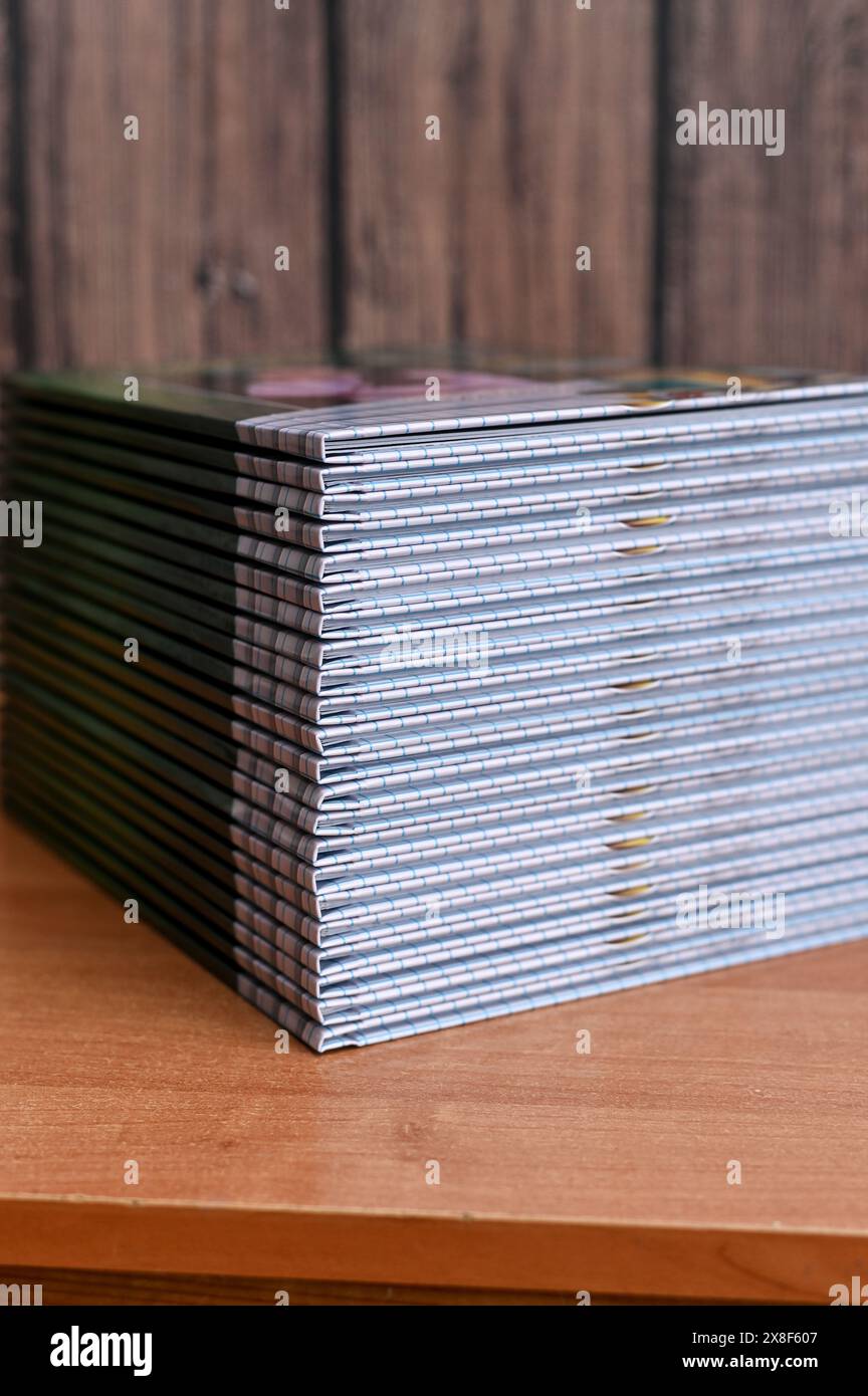 a stack of photo albums. vertical Stock Photo - Alamy