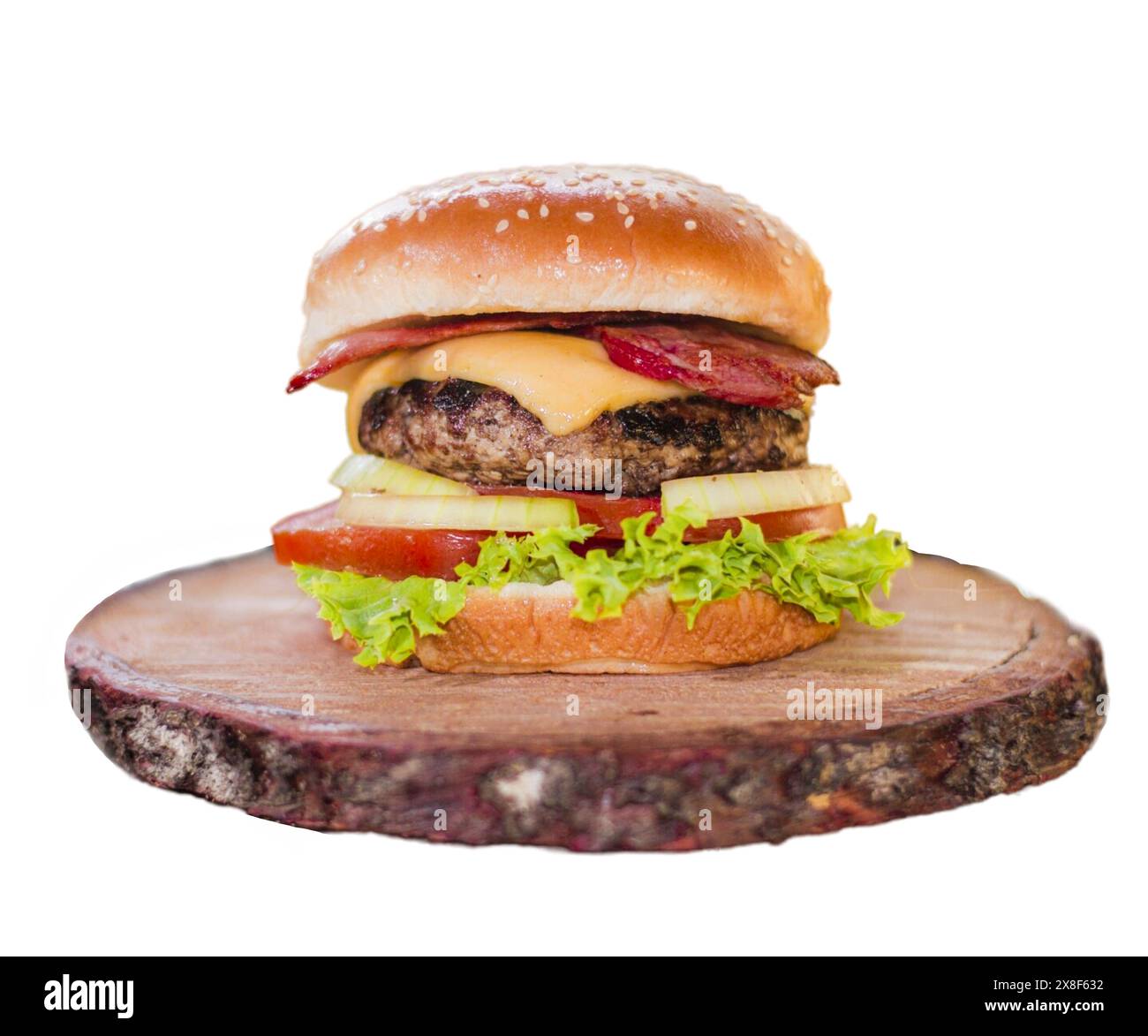 Classic cheeseburger on wood and pickles. Cheese, tomatoes, onions ...