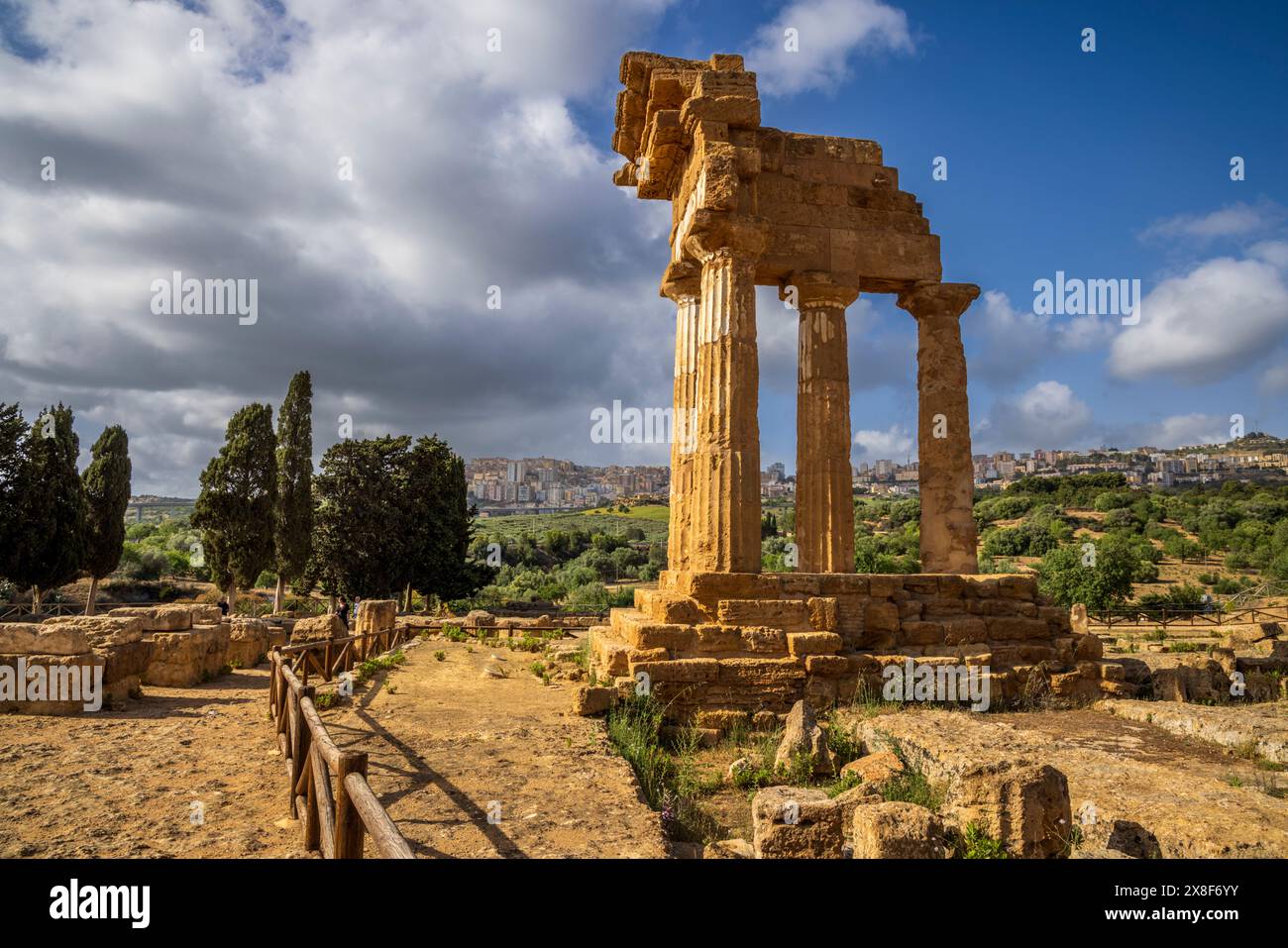 The Greek Temple of Castor and Pollux with Agrigento in the background ...