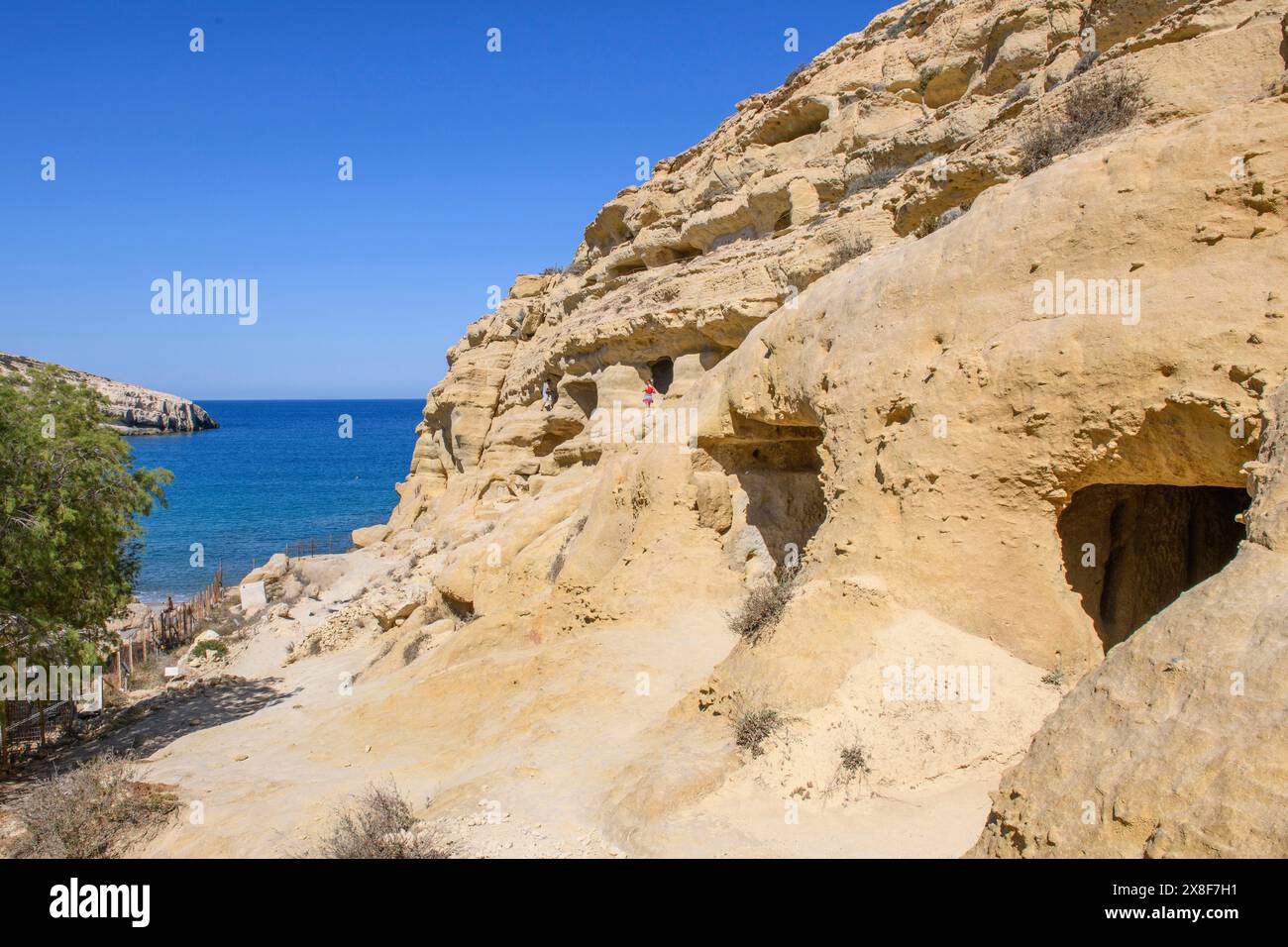 View of entrances of caves in sandstone rocks of former Roman ...